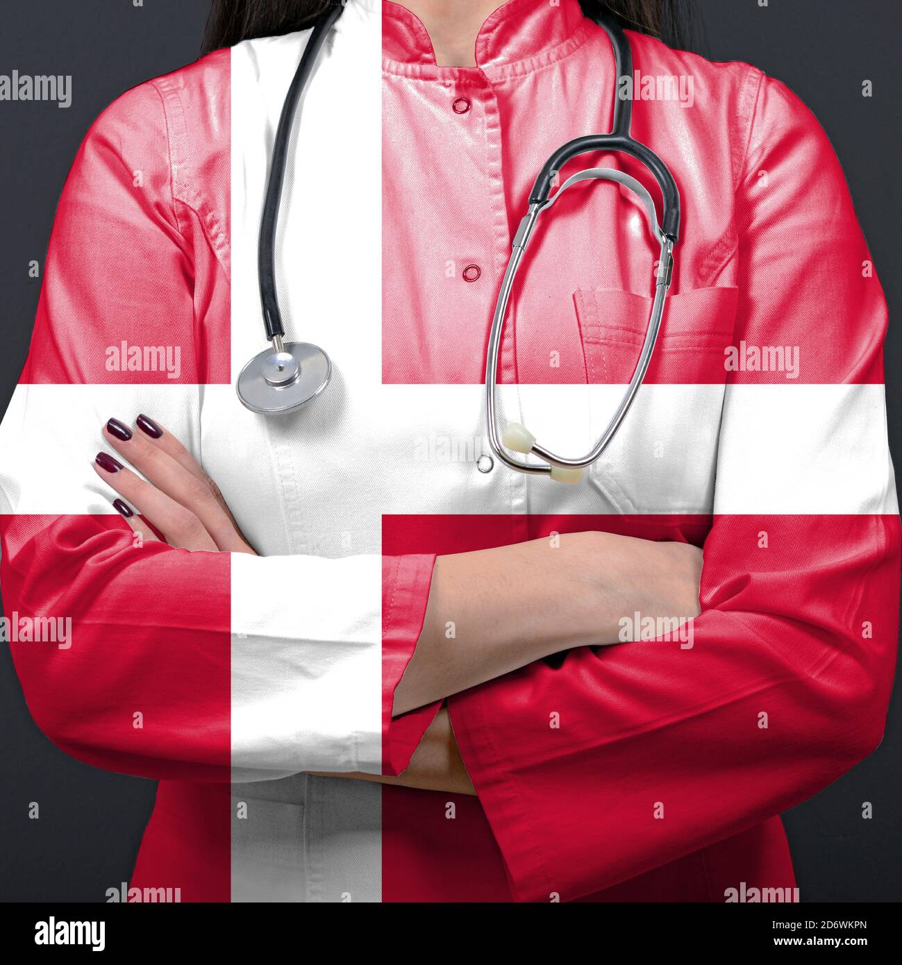 Doctor representing healthcare system with National flag of Denmark ...