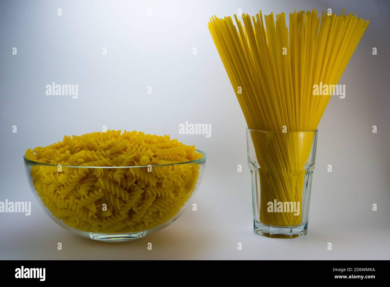 Yellow pasta on a white background. Different types of pasta Stock ...