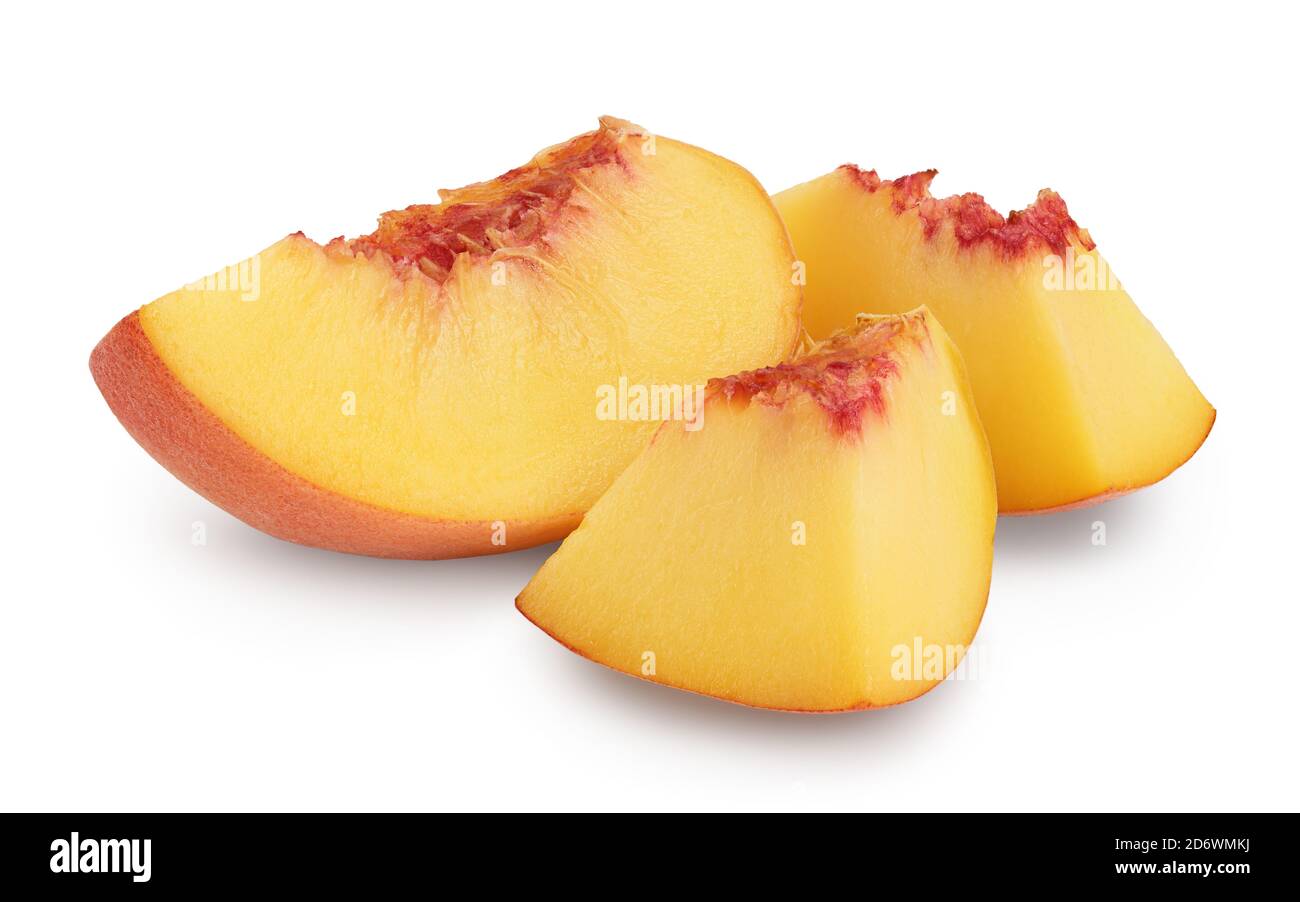 Ripe peach fruit slices isolated on white background with clipping path ...