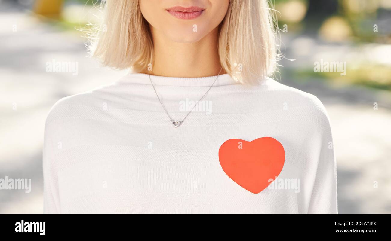 World Heart Day. Faceless portrait of Healthy woman with red heart ...