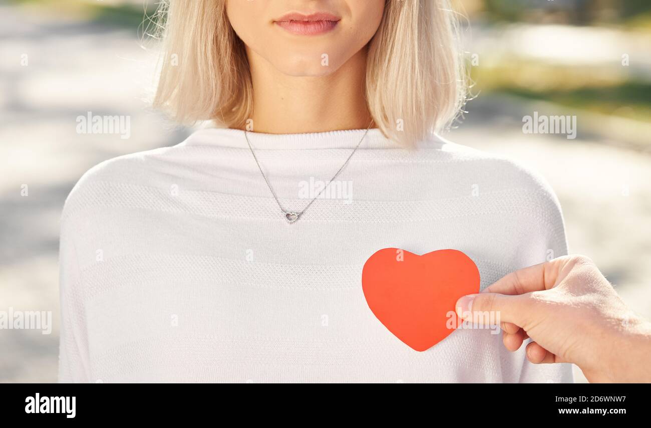 World Heart Day. Faceless portrait of Healthy woman with red heart ...