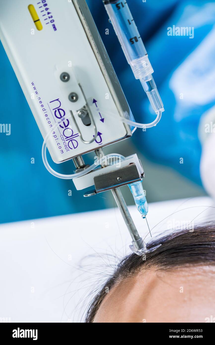 Doctor performing skin rejuvenation using Mesolift treatment consisting ...