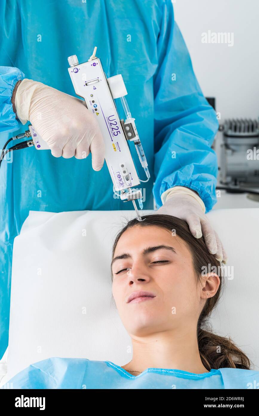 Doctor performing skin rejuvenation using Mesolift treatment consisting ...