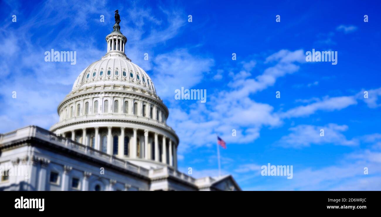 United State Capitol Building for congress with american flag flowing ...