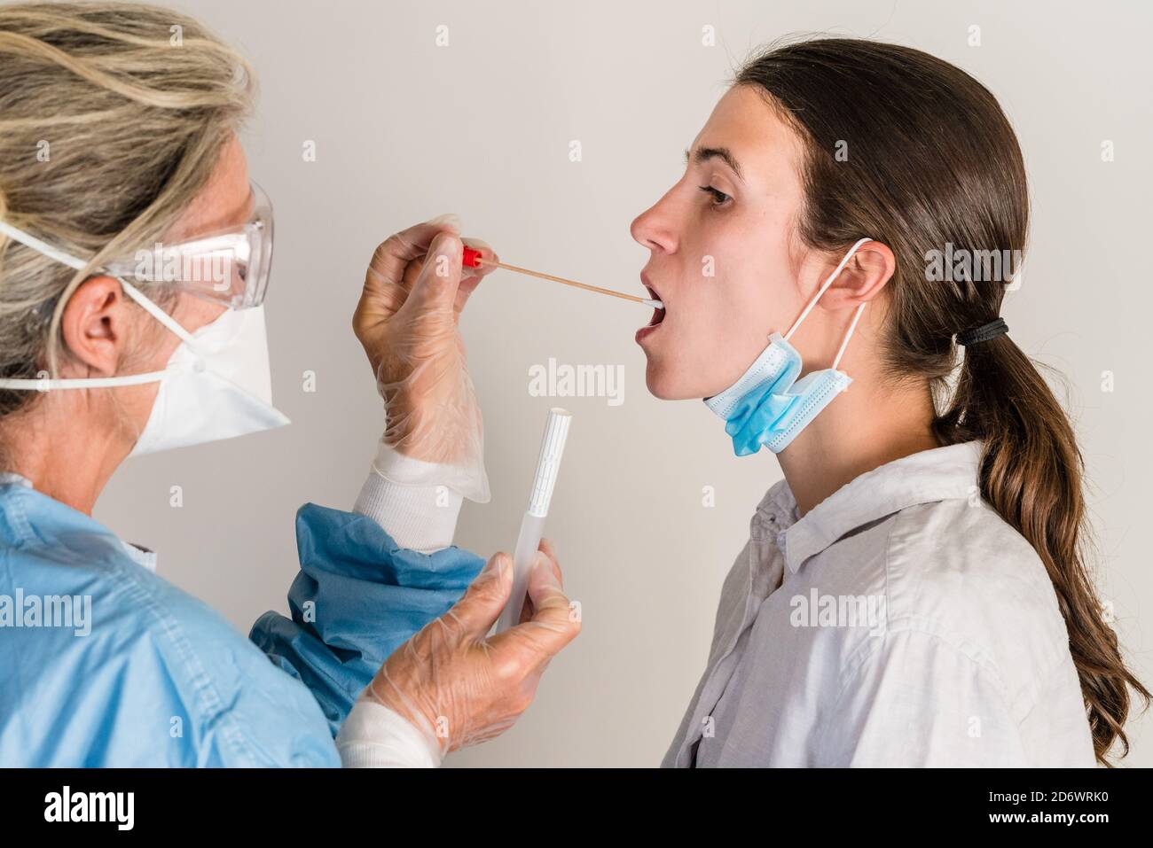 Saliva test woman hi-res stock photography and images - Alamy