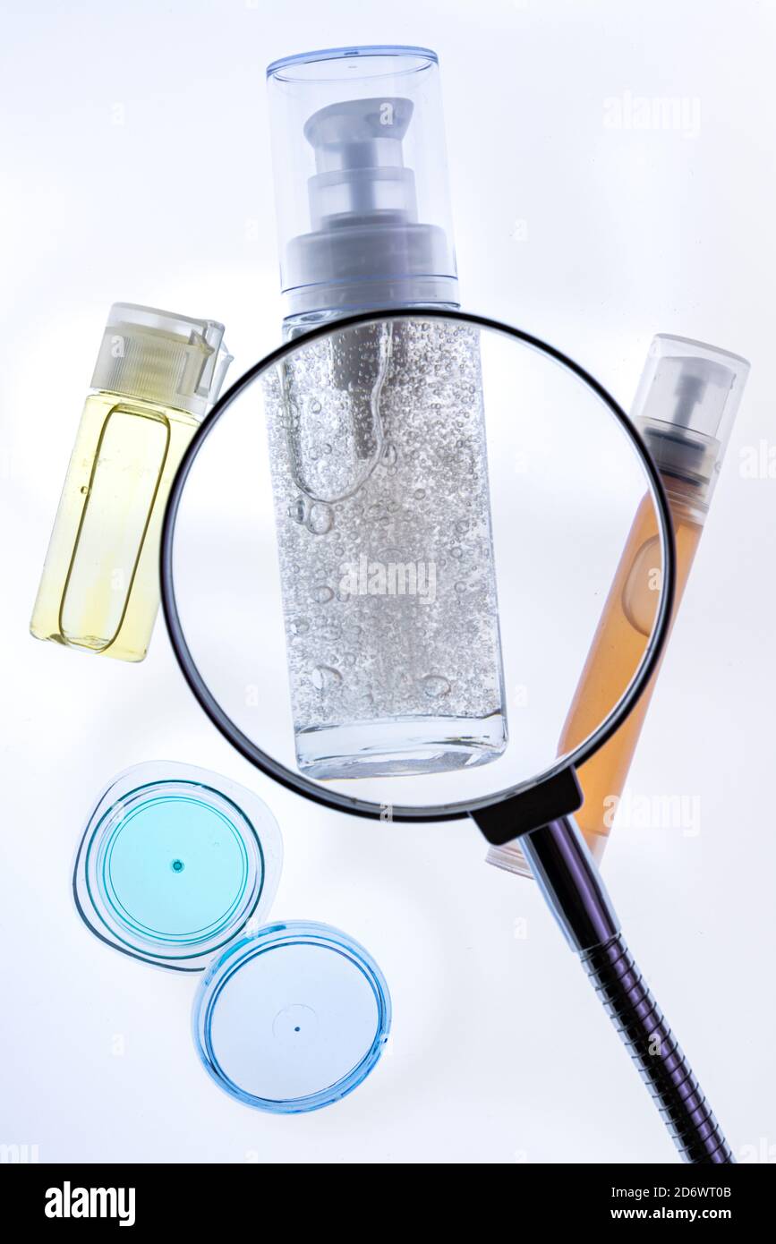 Magnifying glass and bottle hi-res stock photography and images - Alamy