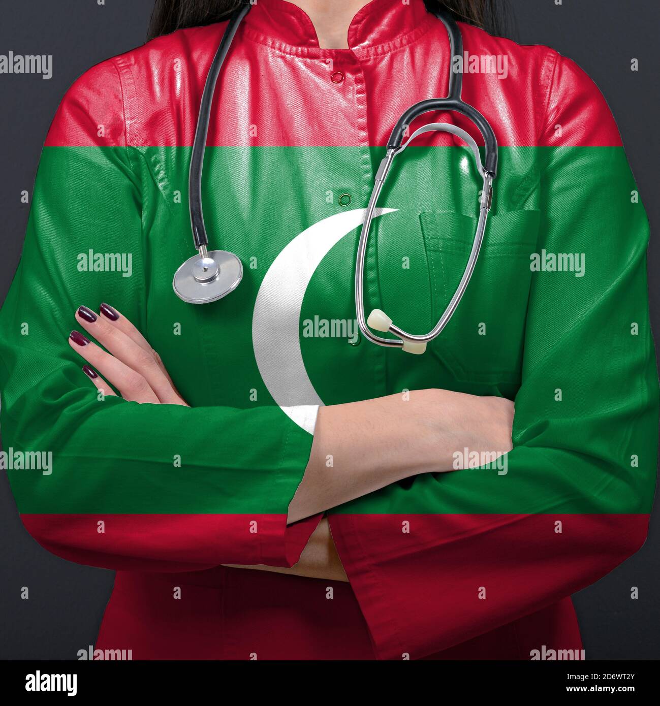 Doctor representing healthcare system with National flag of Maldives ...