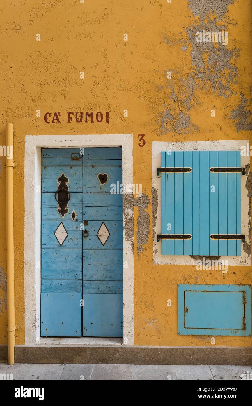 Facade and entrance of an old house Caorle, Veneto, Italy Stock Photo ...