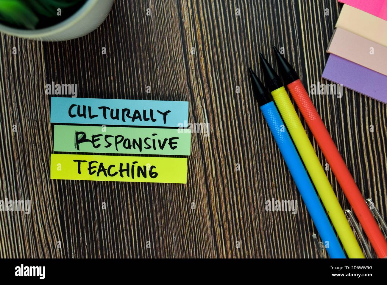 Culturally Responsive Teaching write on sticky notes isolated on Wooden ...