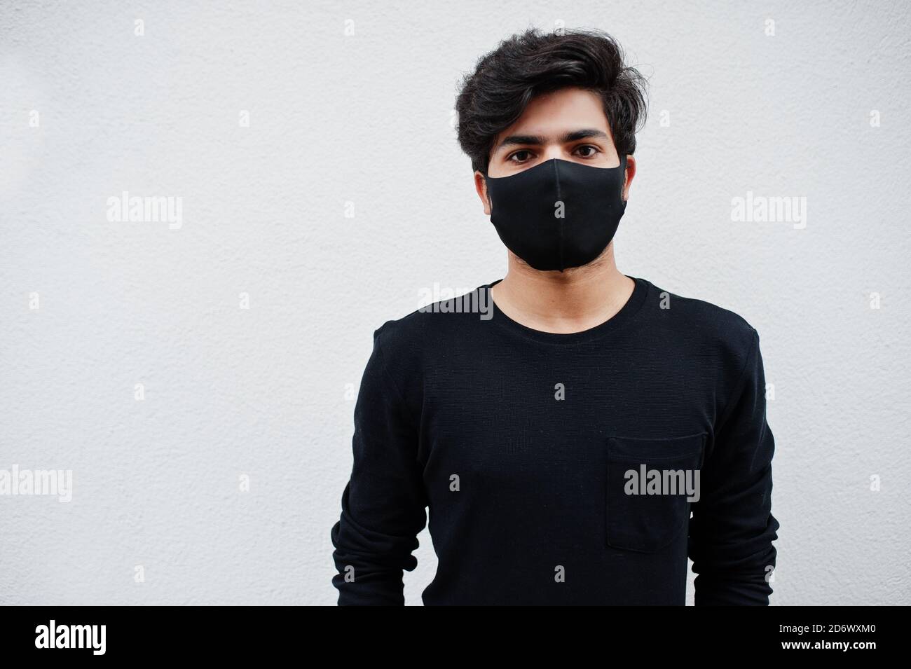 Asian man wear all black with face mask isolated on white background ...
