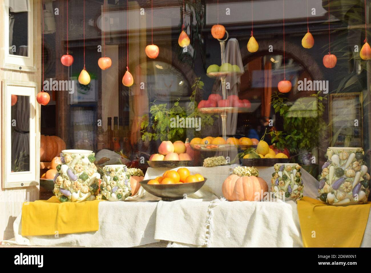 autumn decoration with fruits and pumpkin in the window of a shop Stock ...