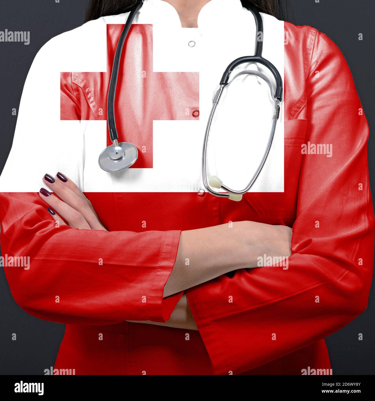 Doctor representing healthcare system with National flag of Tonga Stock ...