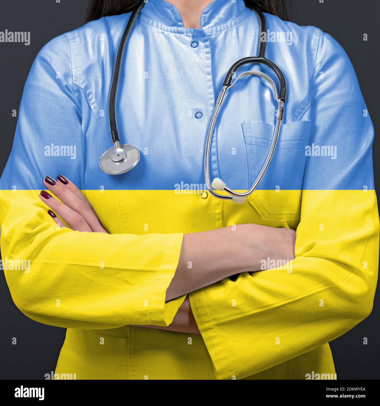 Doctor representing healthcare system with National flag of Ukraine ...