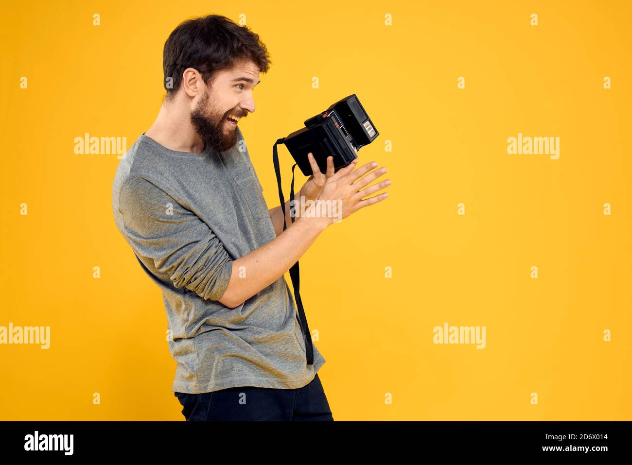 Male photographer with professional photo camera. Professional Creative ...