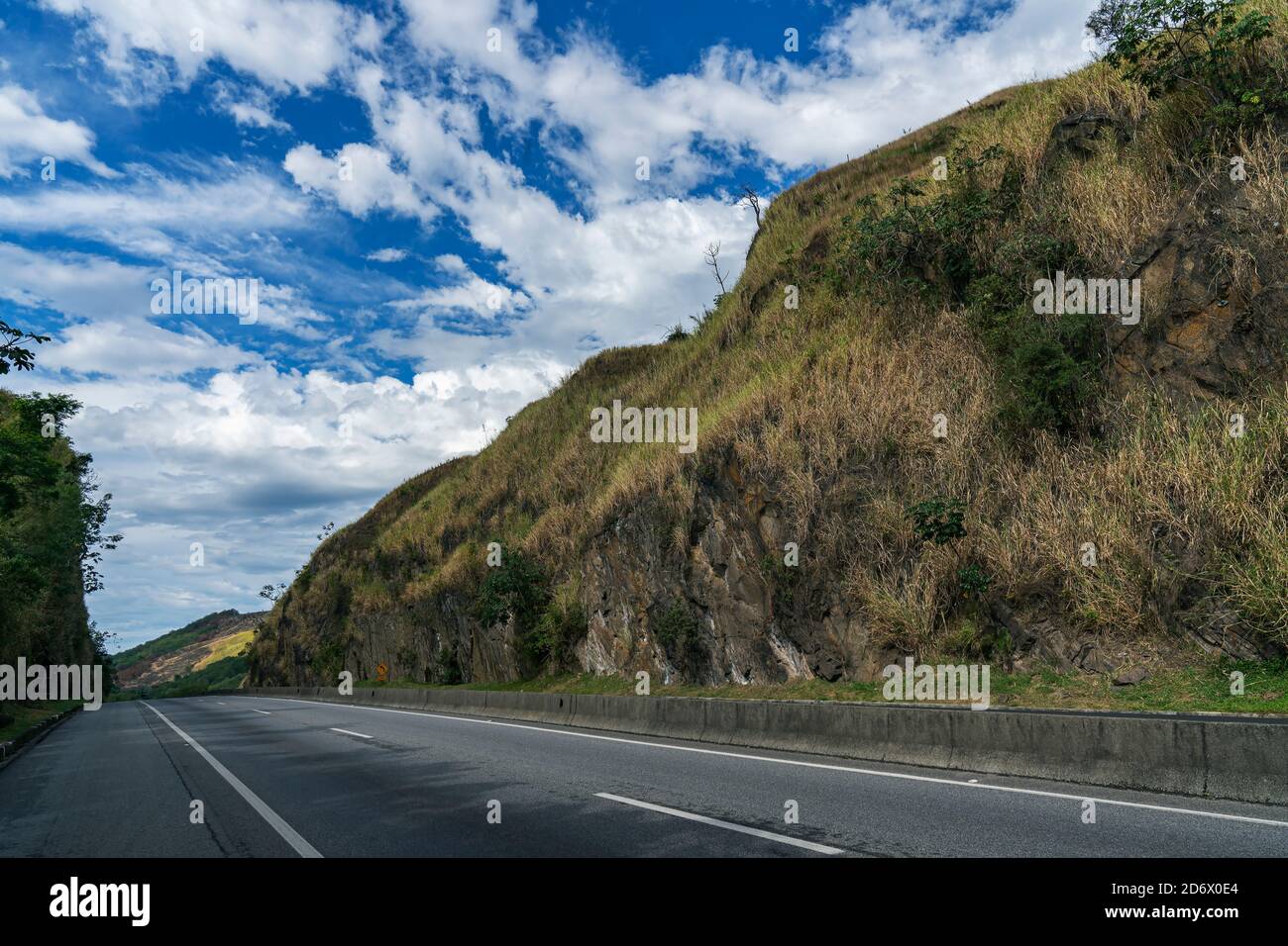 Driving between rocks. Beautiful Country roads and nature Stock Photo ...