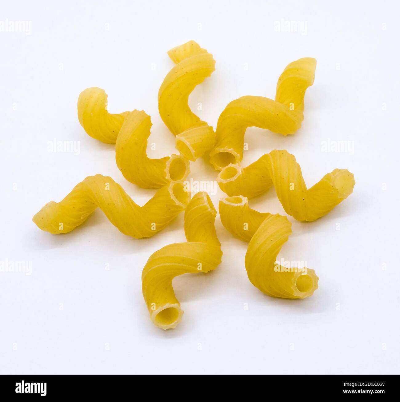 spiral macaroni, macaroni patterns, swirls of macaroni on a white ...