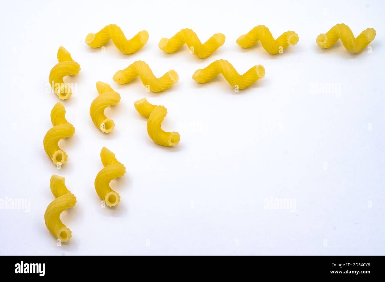 spiral macaroni, macaroni patterns, swirls of macaroni on a white ...