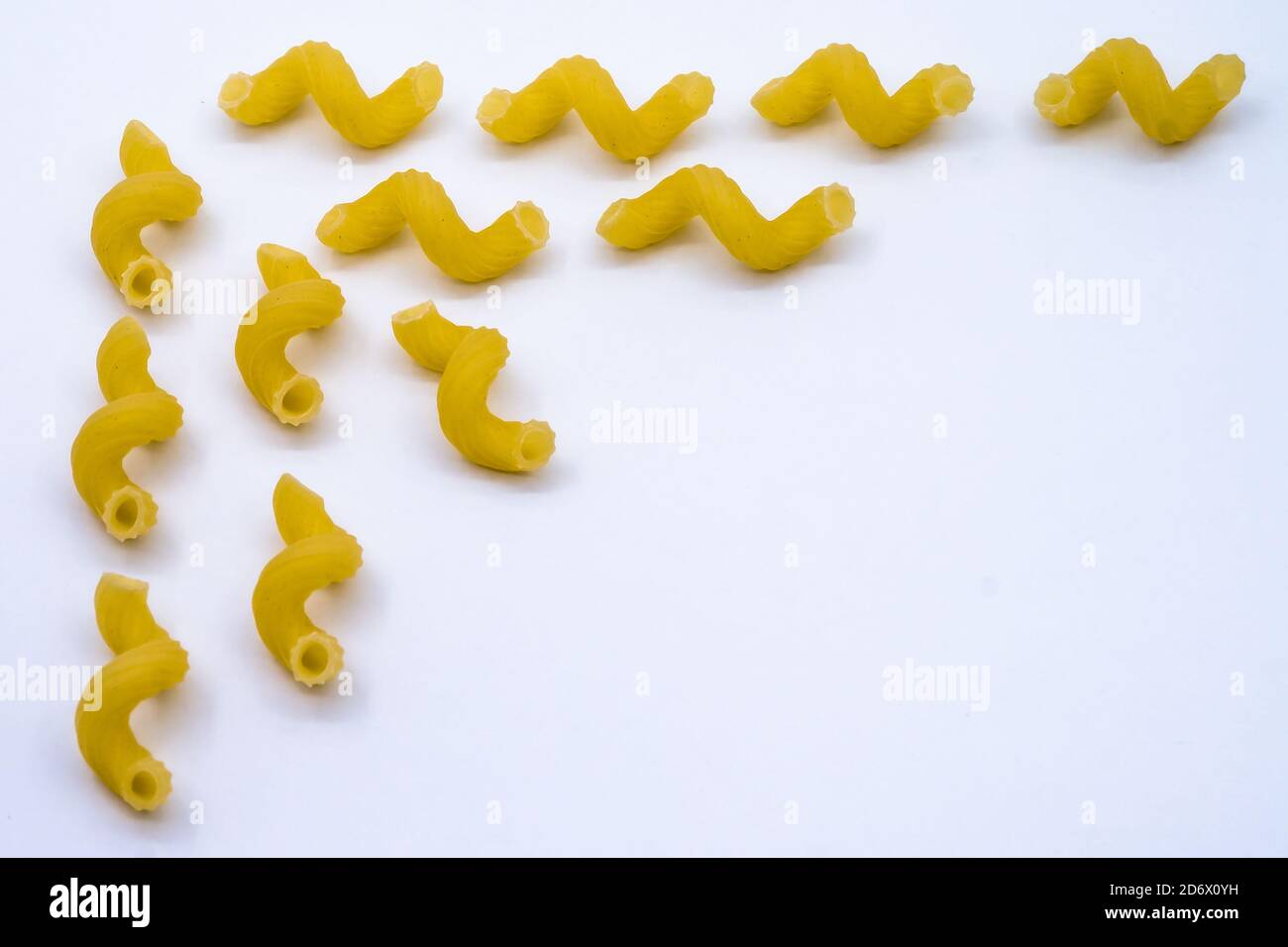 spiral macaroni, macaroni patterns, swirls of macaroni on a white ...