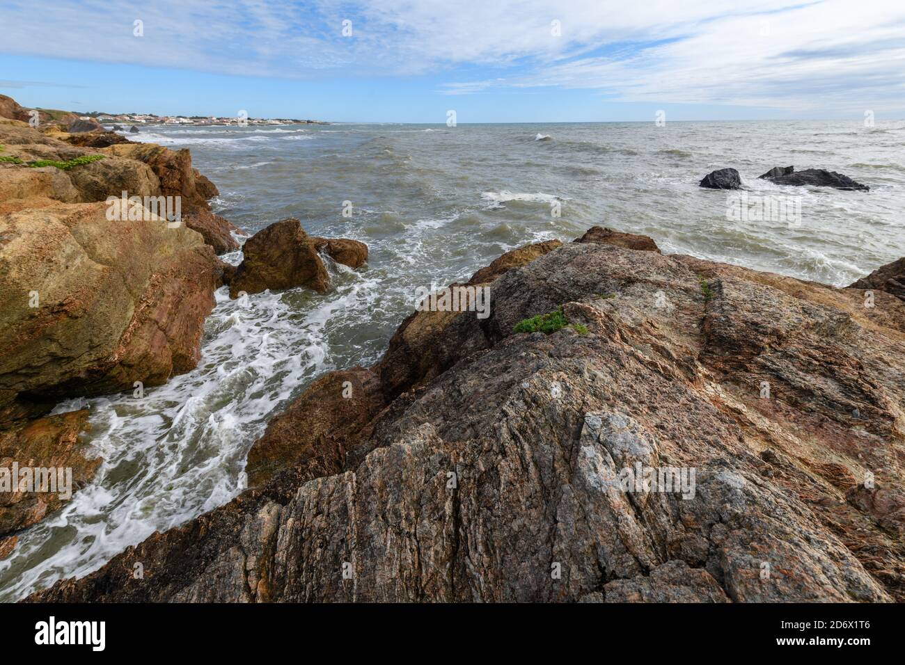 Breaking waves on the rocks of a cliff on the French Atlantic coast in ...