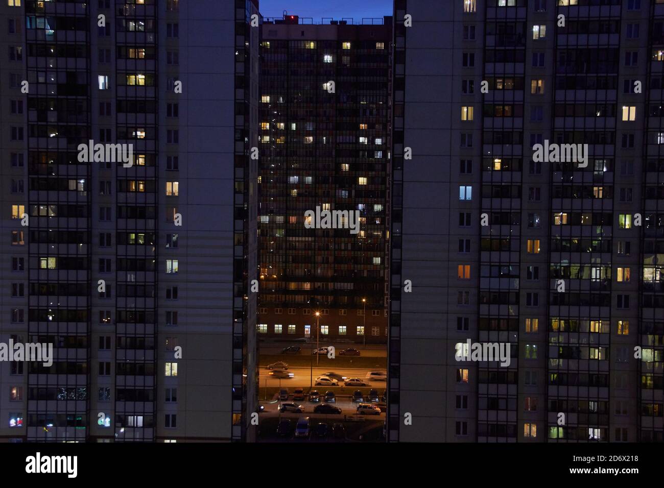 colorful windows lights of the high-rise residential building in city ...