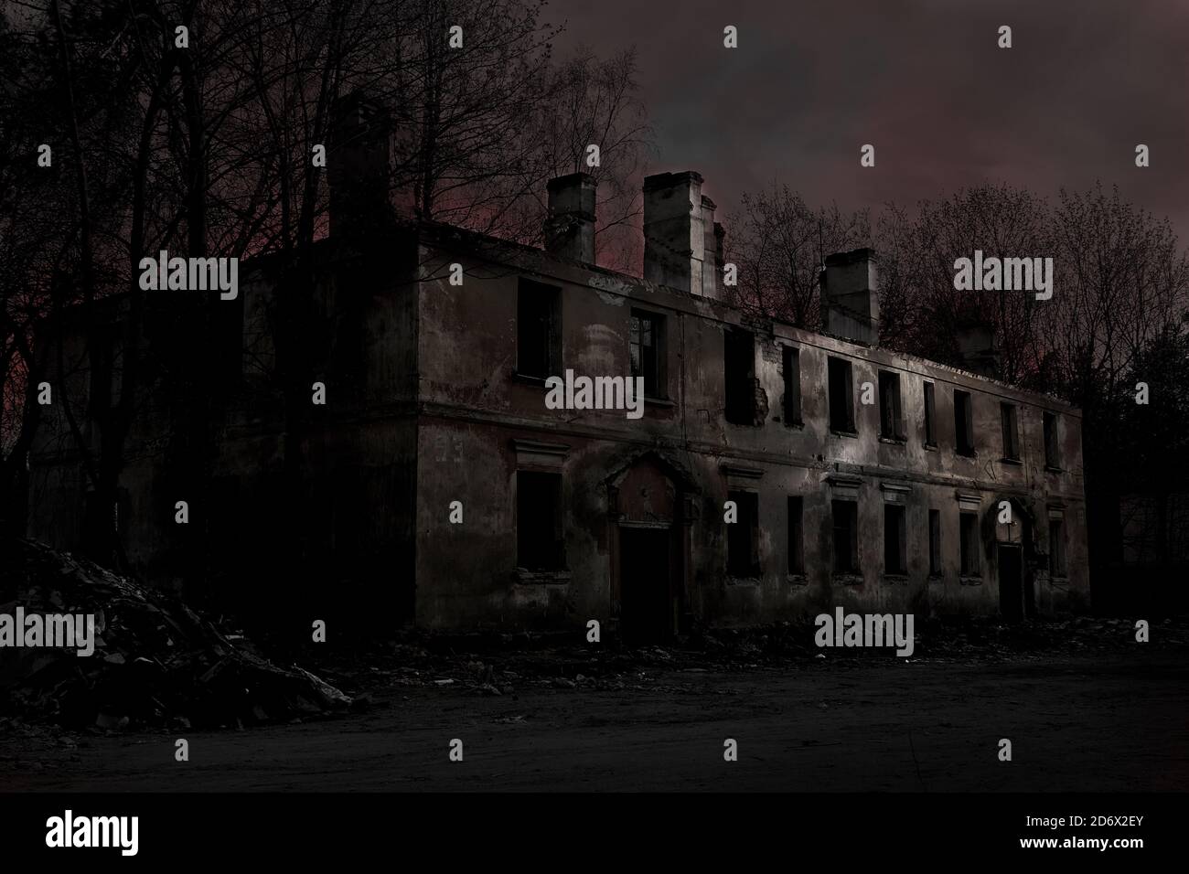 scary abandoned building with dark Windows at sunset Stock Photo - Alamy