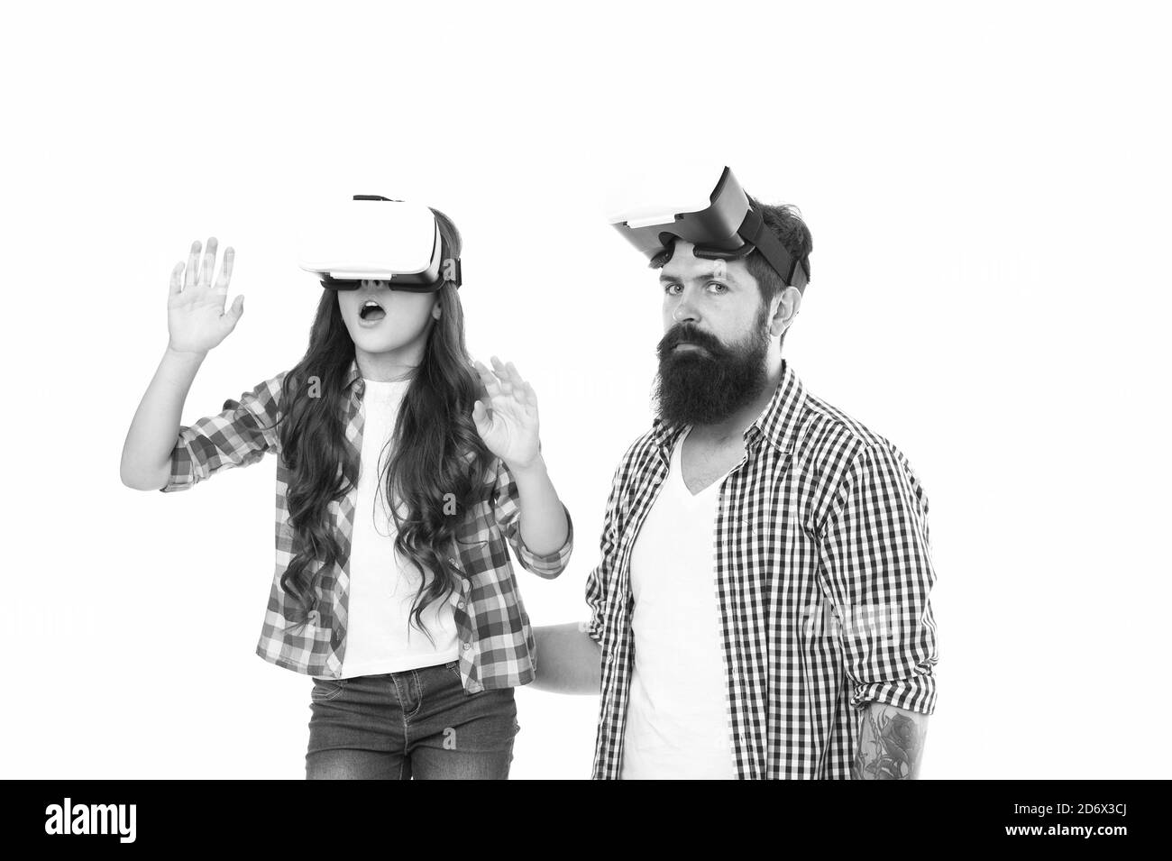 father and daughter in vr glasses. amazed kid with dad use modern ...
