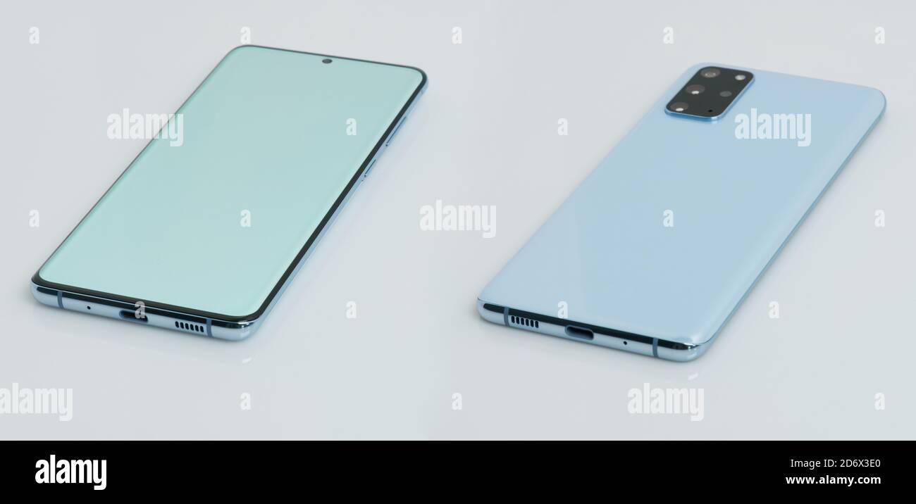 Blue modern smartphone lay on white surface isolated Stock Photo - Alamy