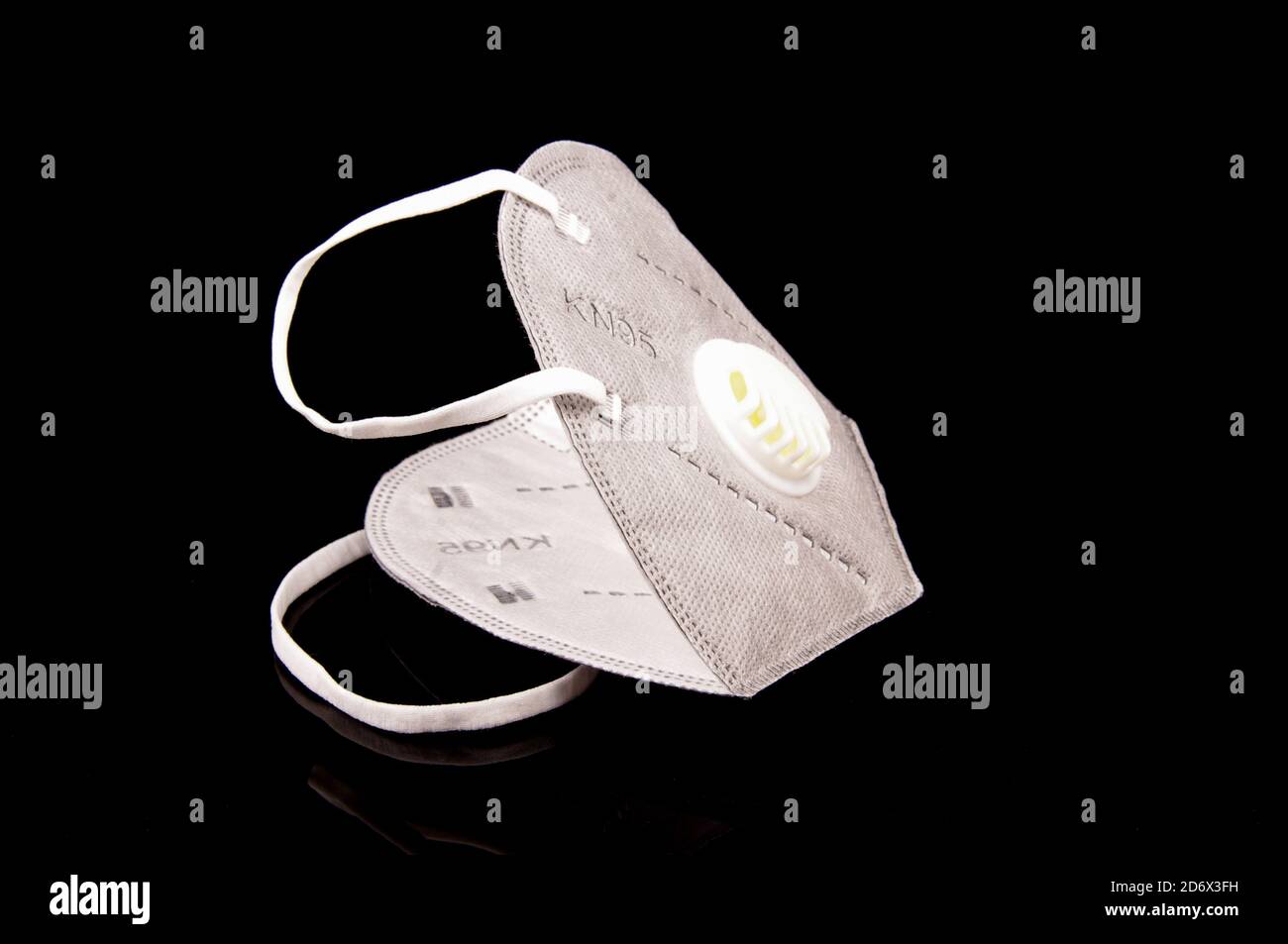 Gray medical respirator marked KN95 for virus and dust protection ...