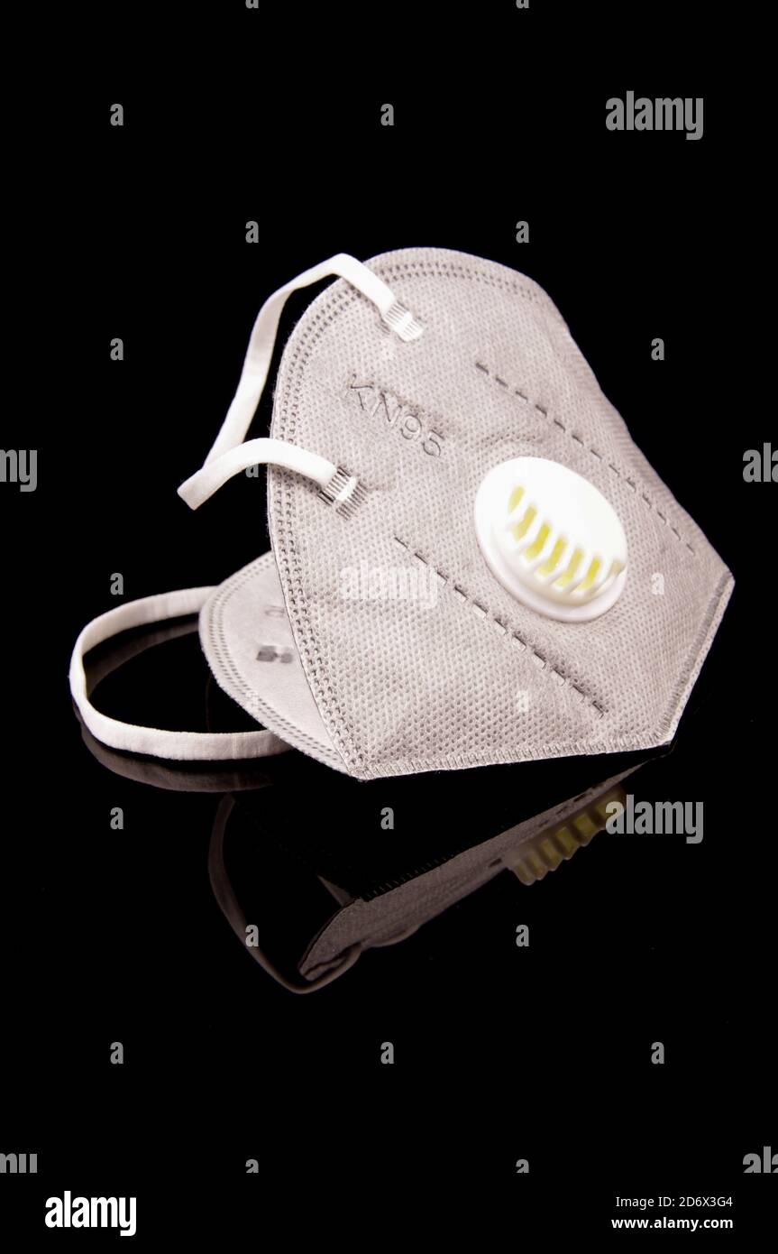 Gray medical respirator marked KN95 for virus and dust protection ...