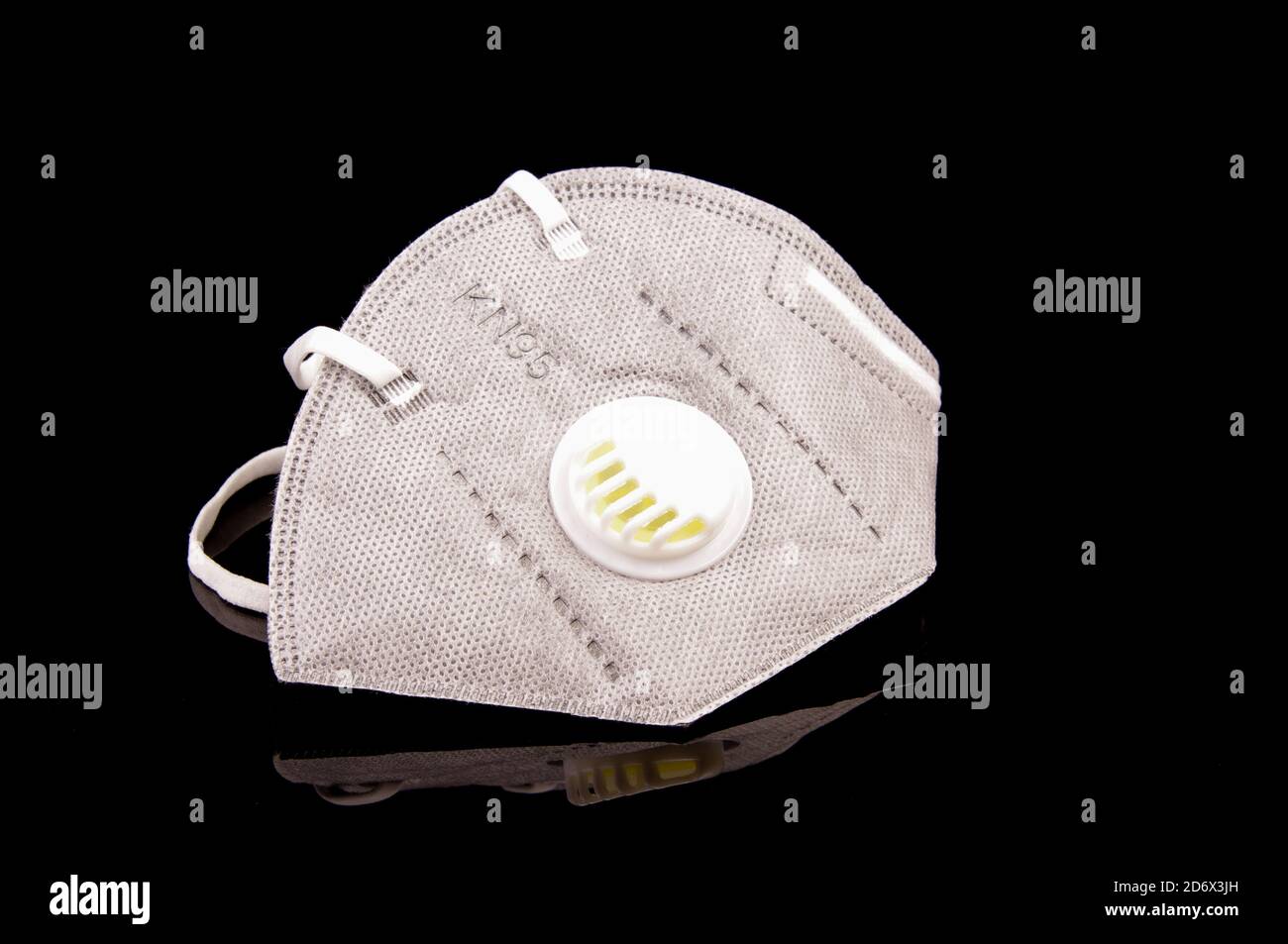 Gray medical respirator marked KN95 for virus and dust protection ...