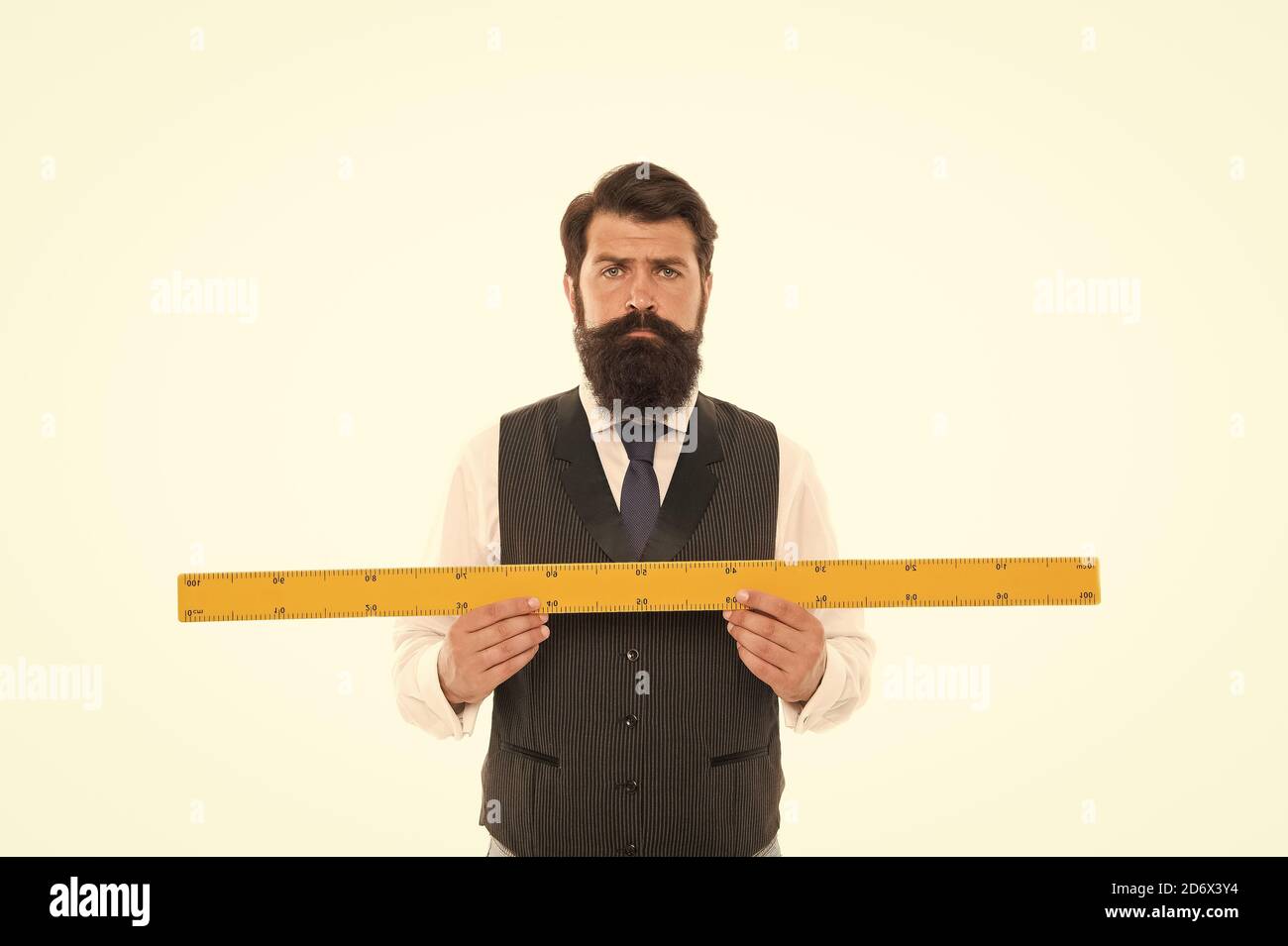 Teacher holding a ruler hi-res stock photography and images - Alamy