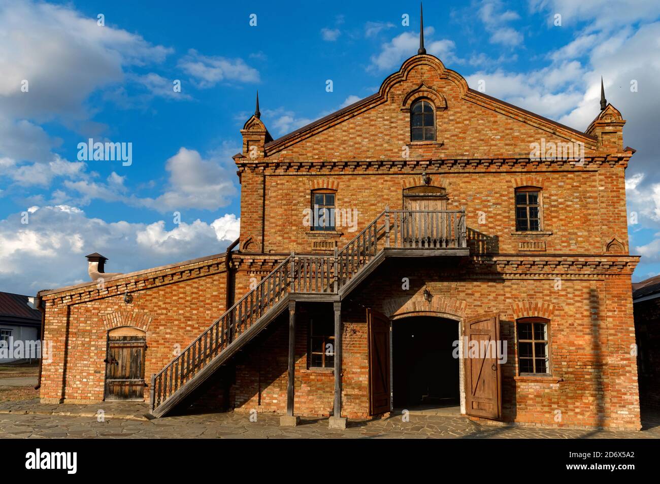 Old red brick mill. View from outside on autumn day Stock Photo - Alamy