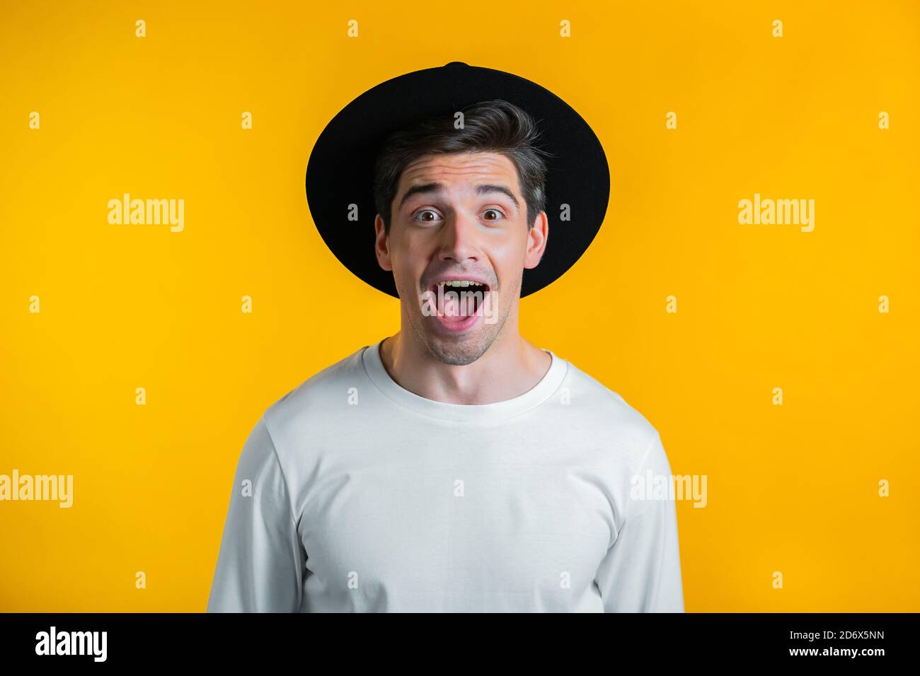 Man depicts amazement, shows WOW delight face effect. Surprised excited ...