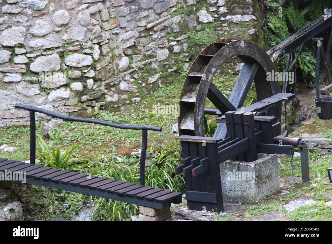 Wooden upper wheels with blades of an old watermill Stock Photo - Alamy
