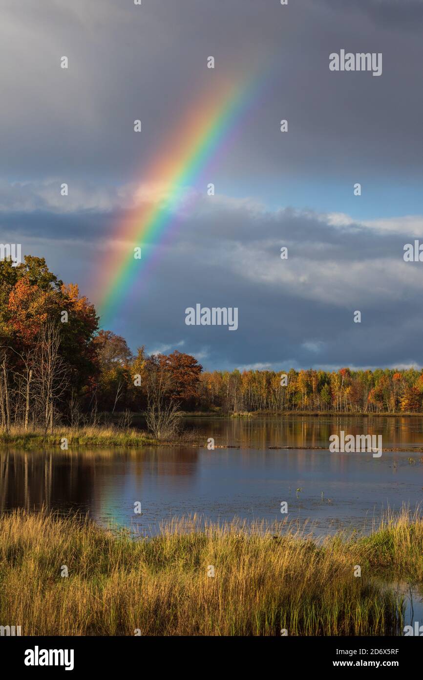 Beautiful rainbow over fall colors hi-res stock photography and images ...