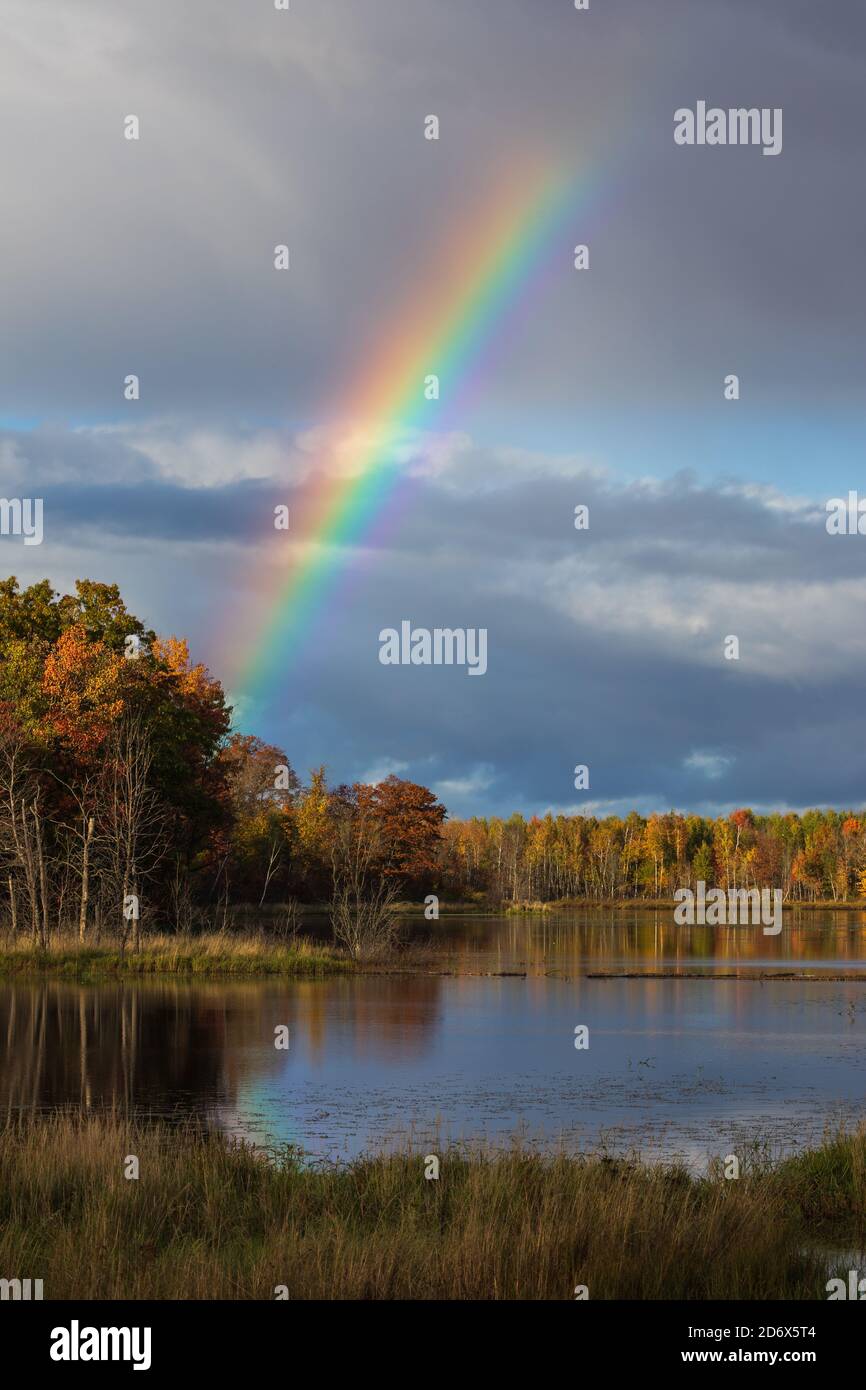 Beautiful rainbow over fall colors hi-res stock photography and images ...