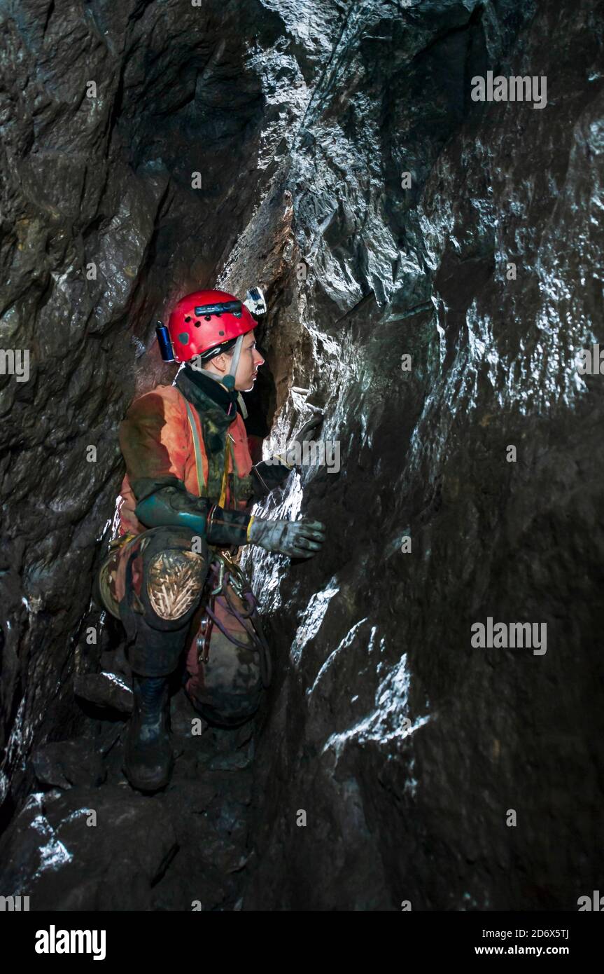 Ancient miners' gunpowder shotholes in the wall of a mineral vein in ...