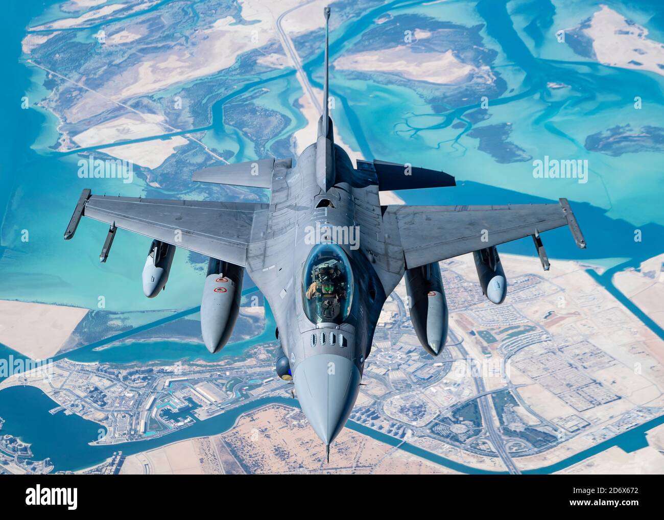 A U.S. Air Force F-16 Fighting Falcon flies over the U.S. Central ...