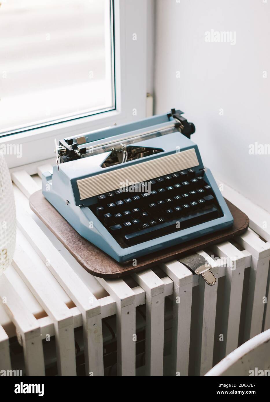 Old retro typewriter on the windowsill. Vintage interior details Stock ...