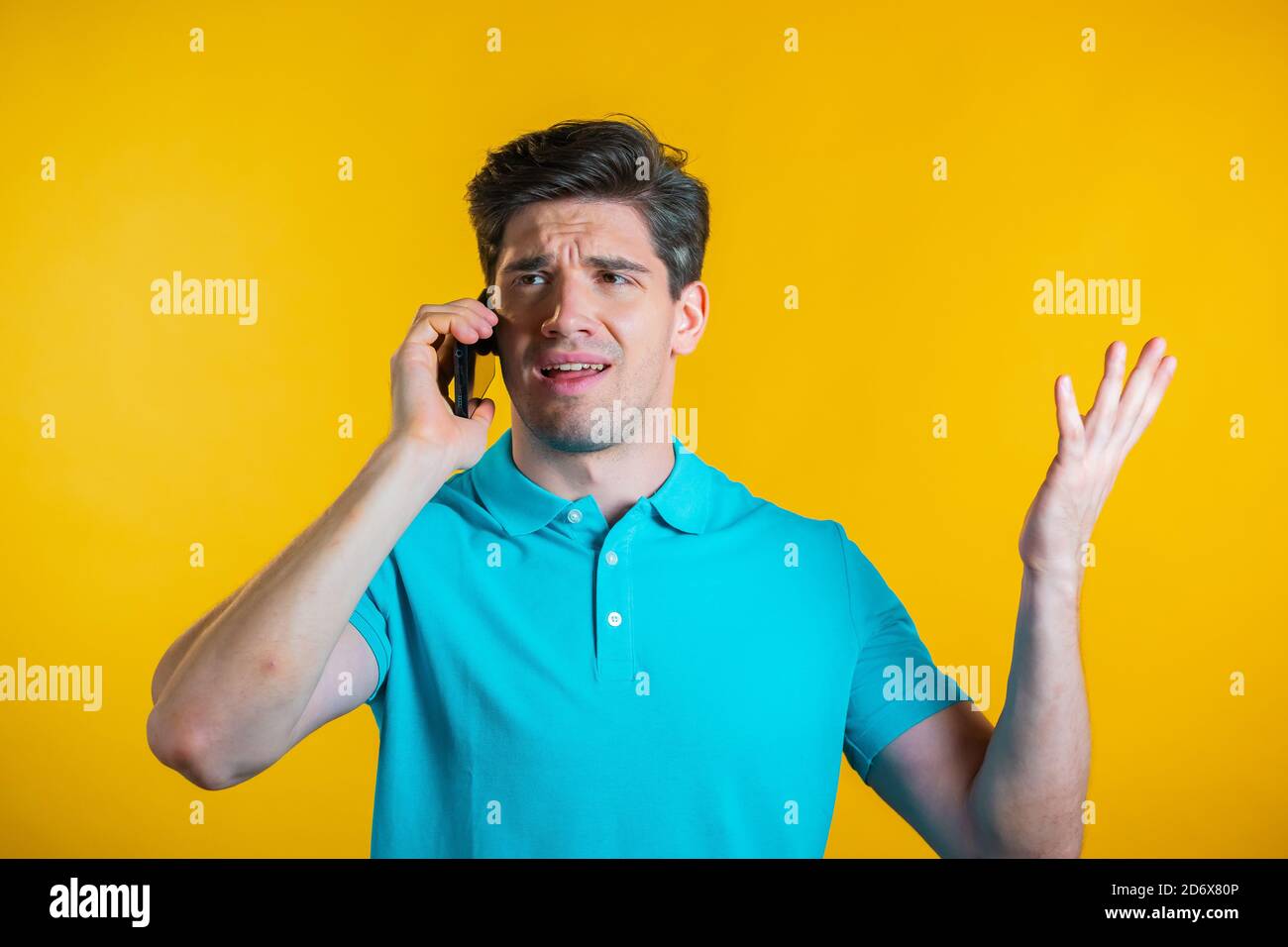 Man outraged and speaking on mobile phone. Having nervous, shouting in ...