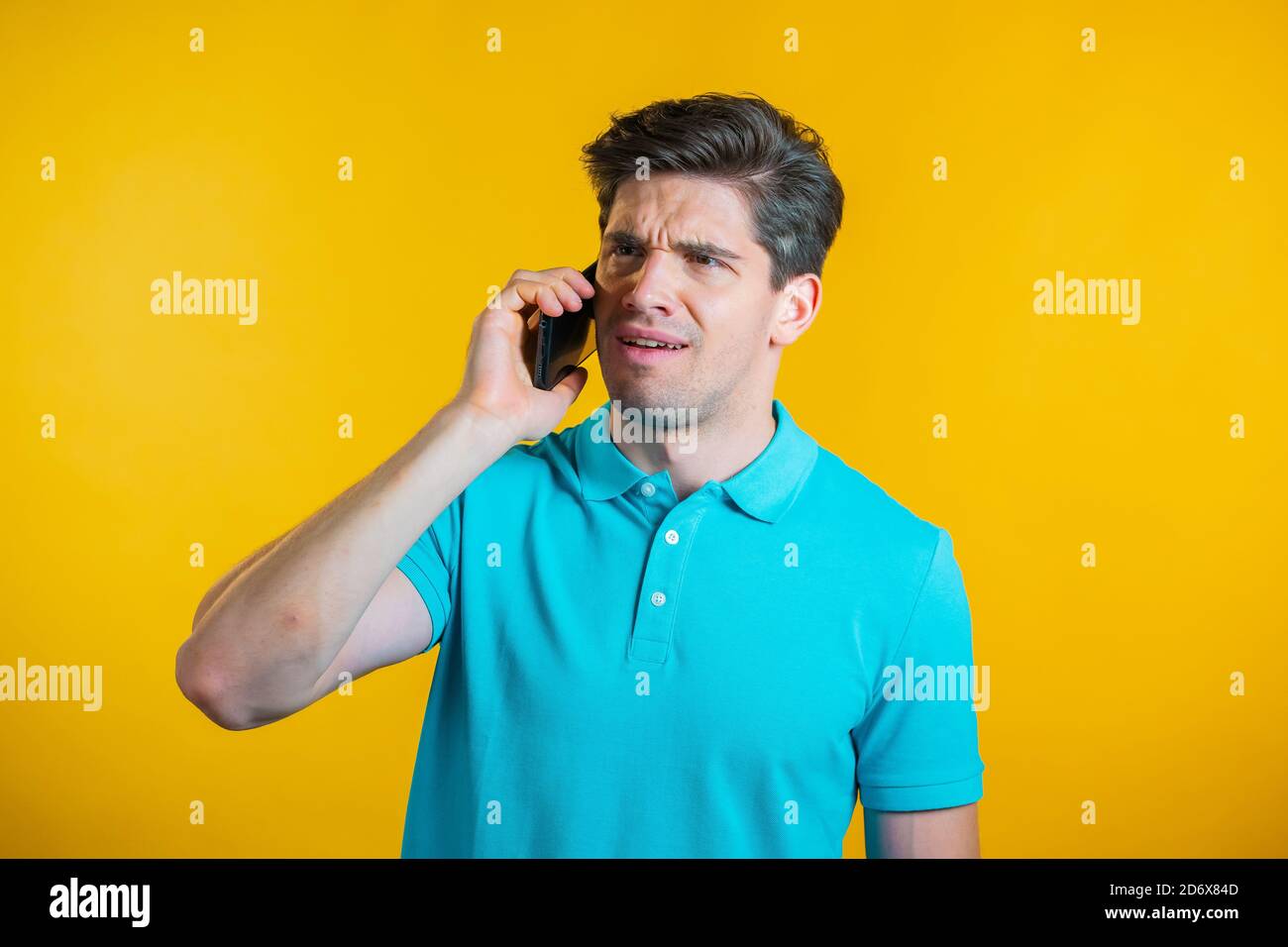 Man outraged and speaking on mobile phone. Having nervous, shouting in ...