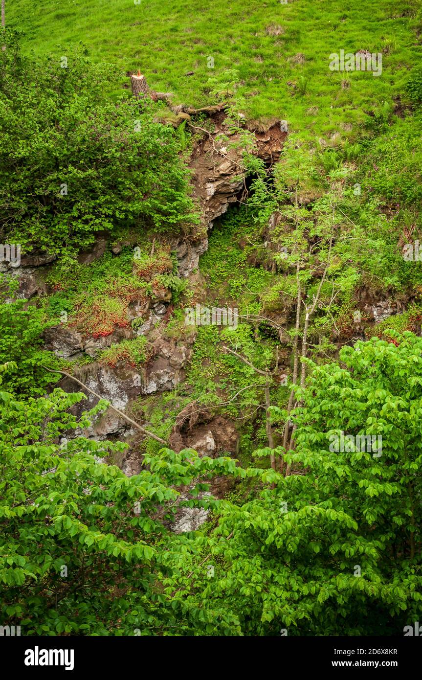 Small collapsing cave high in the side of the gorge at Odin Mine near ...