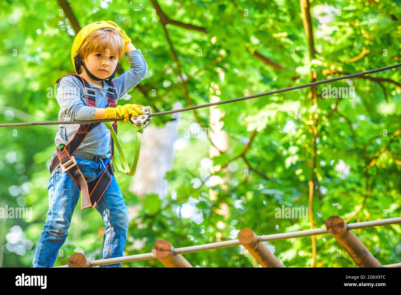 Cute child boy playing. Artworks depict games at eco resort which ...