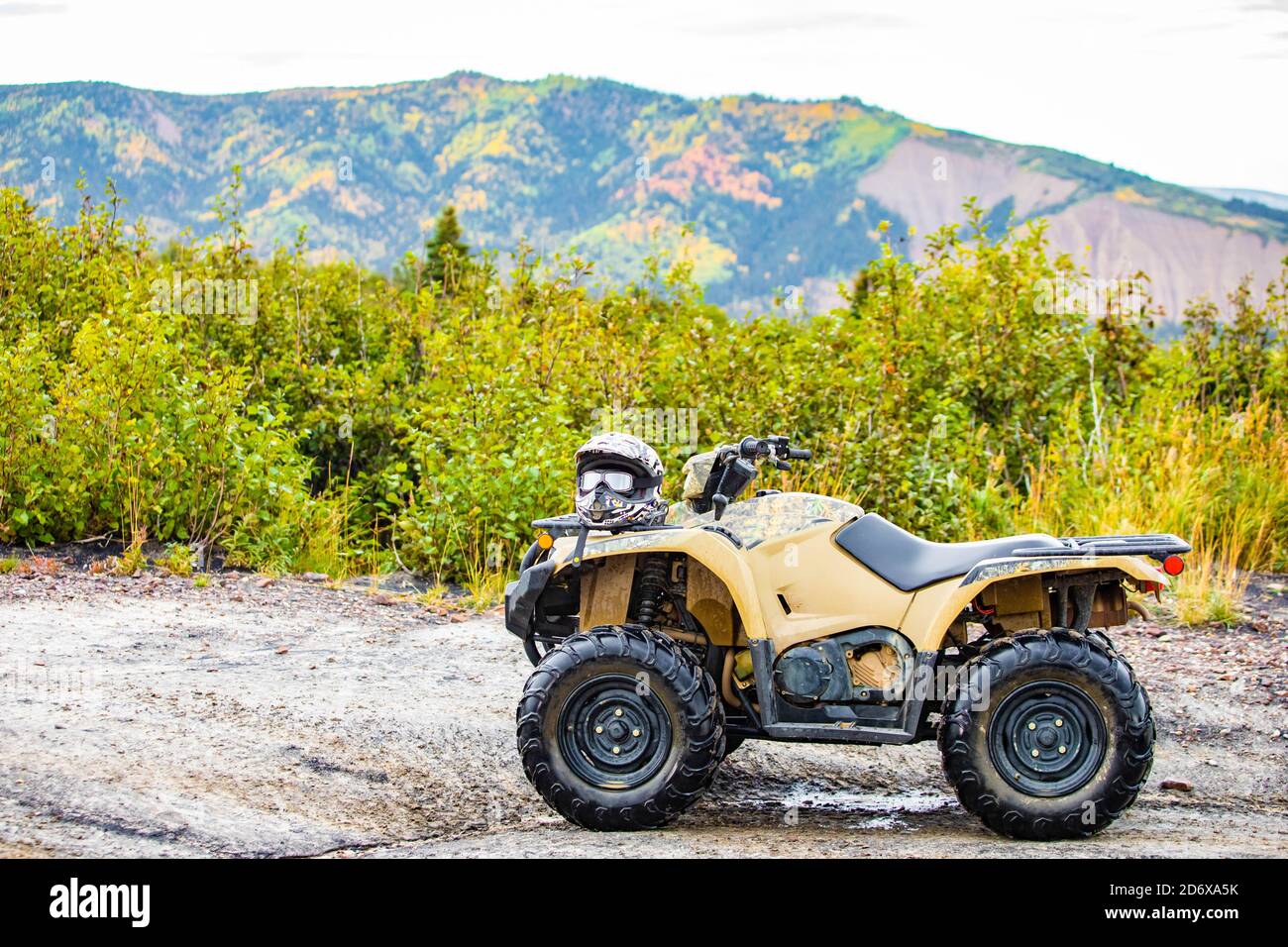 Dirty ATV with scenic background perfect for off road adventures at ...