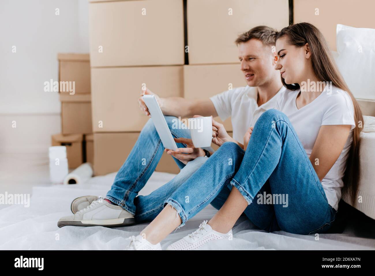 Young couple making orders hi-res stock photography and images - Alamy