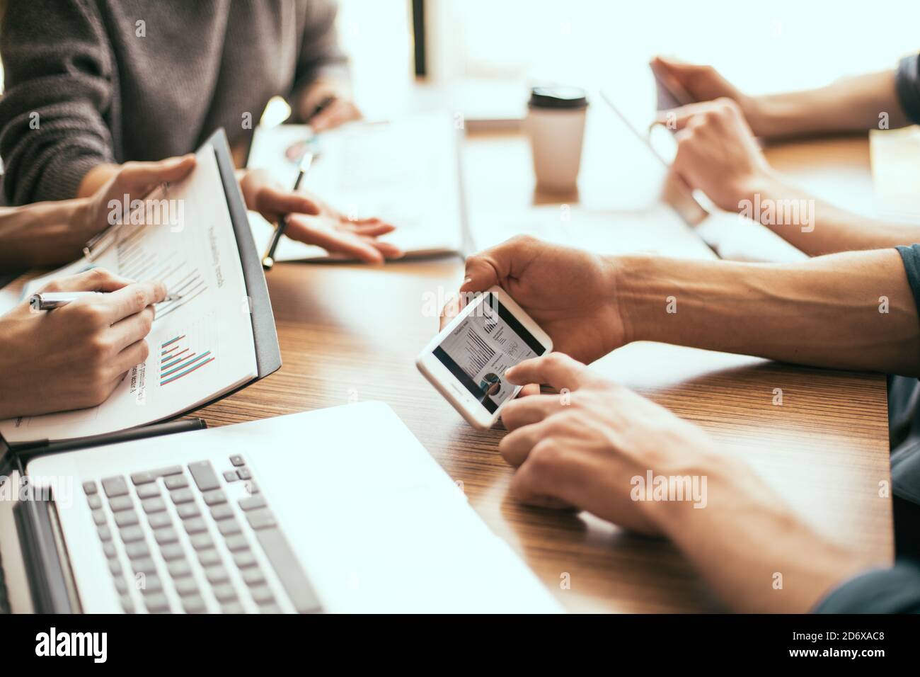 close up. working group analyzing financial statistics Stock Photo - Alamy