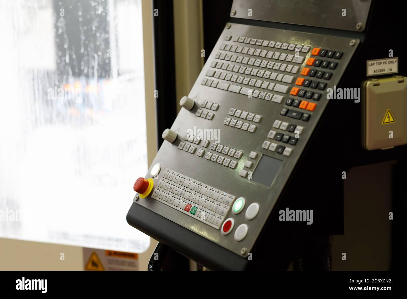 Control panel of 5-axis metalworking CNC machine. Selective focus Stock ...