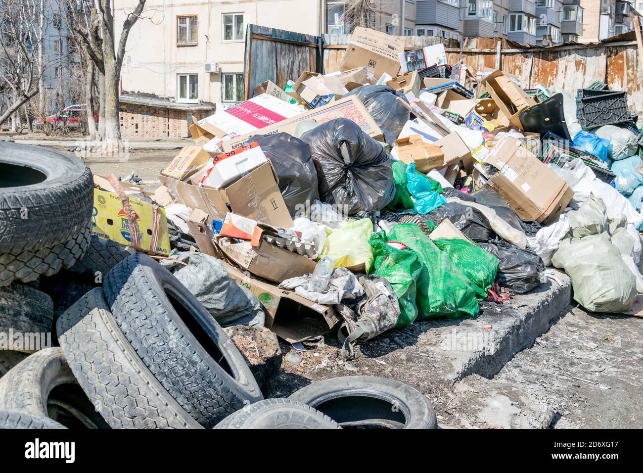 Russia, Vladivostok, 03/23/2020. Garbage dump in residential area. Dirt ...