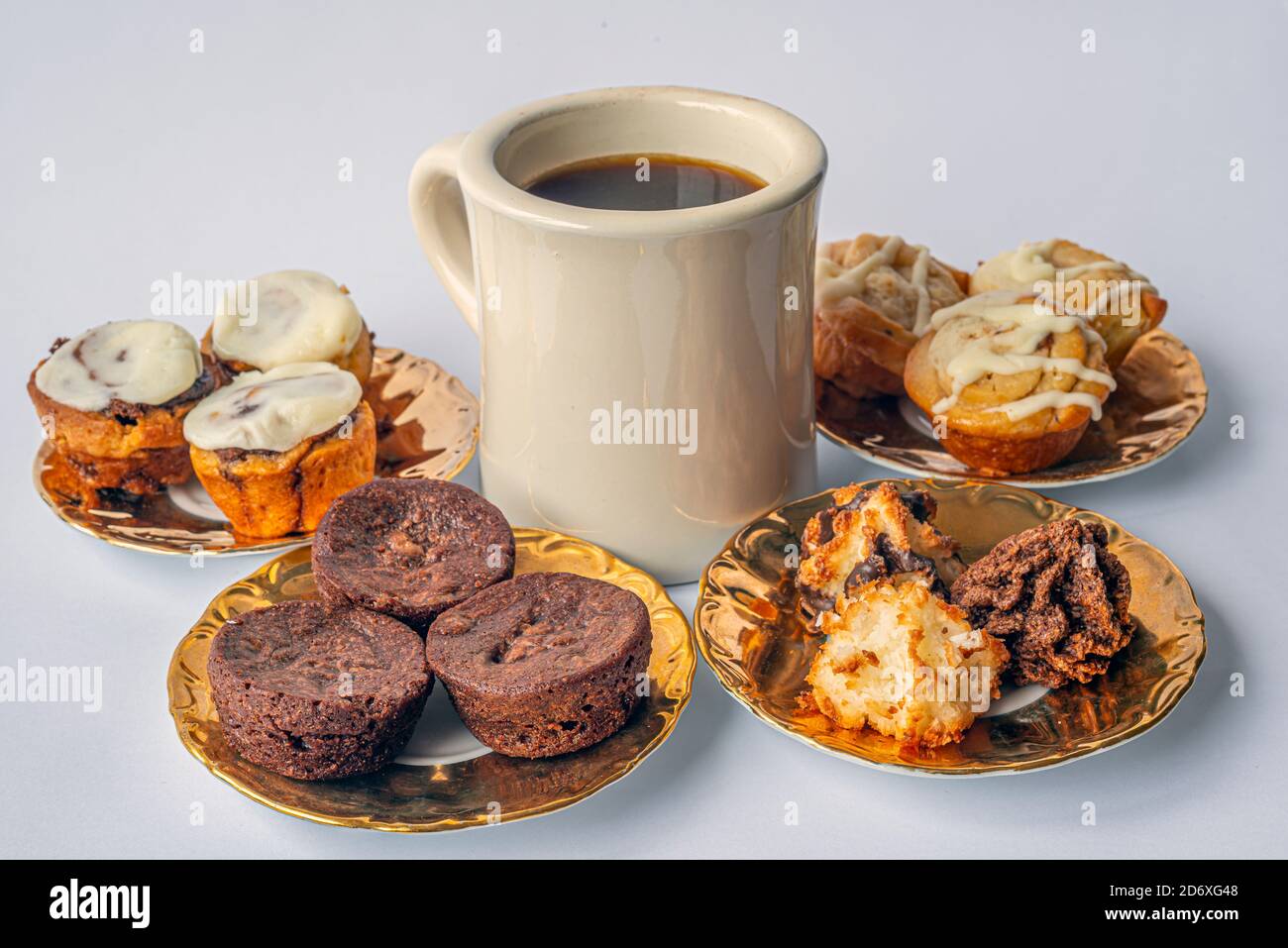 Cup of coffee with various pastry Stock Photo - Alamy
