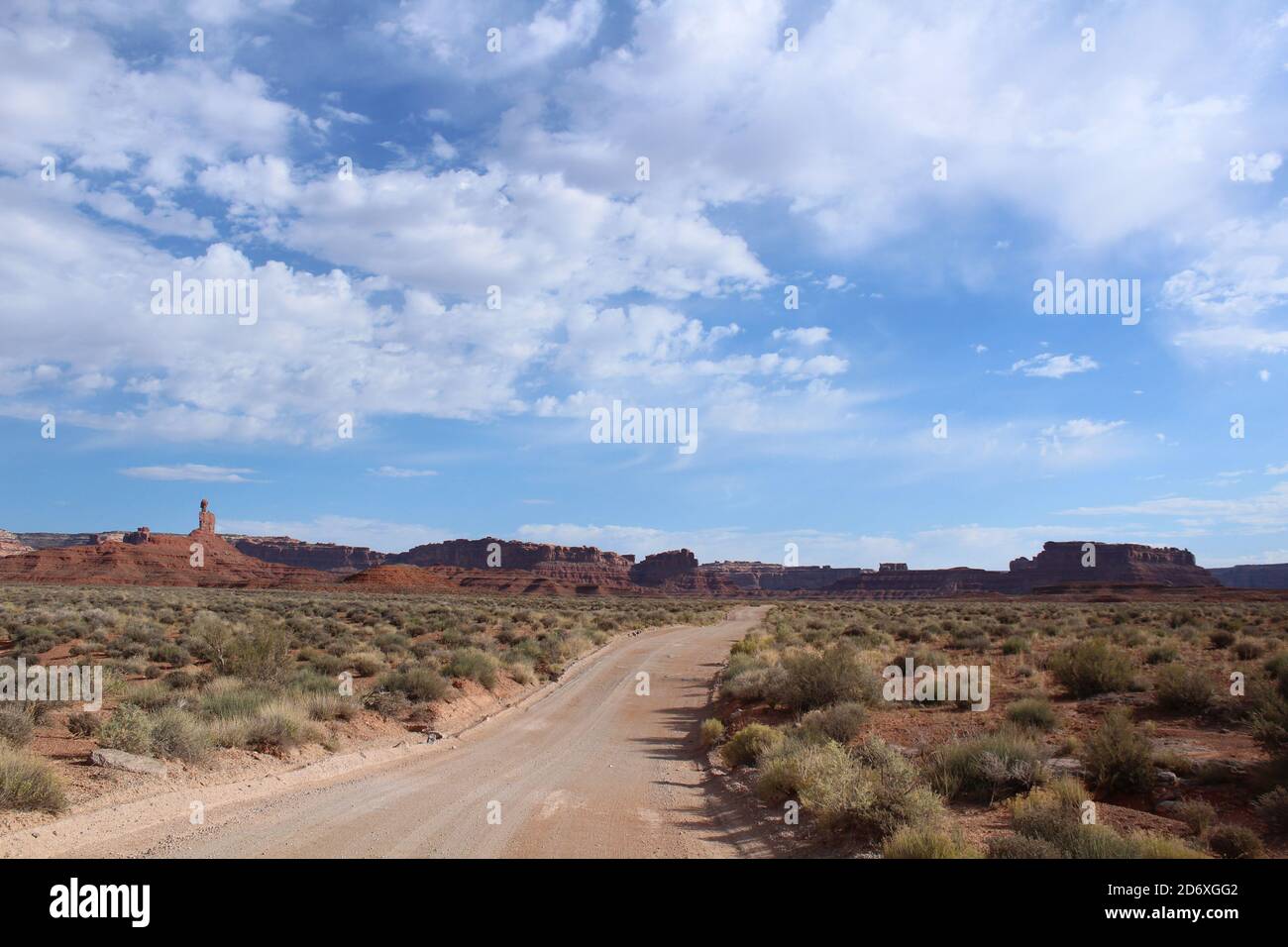 Scenic drive through Valley of the Gods, Utah, featuring desert valleys ...